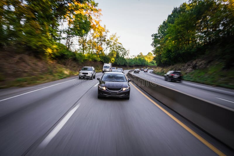 Cars In A Rush Moving Fast On A Highway Stock Photo - Image of light ...