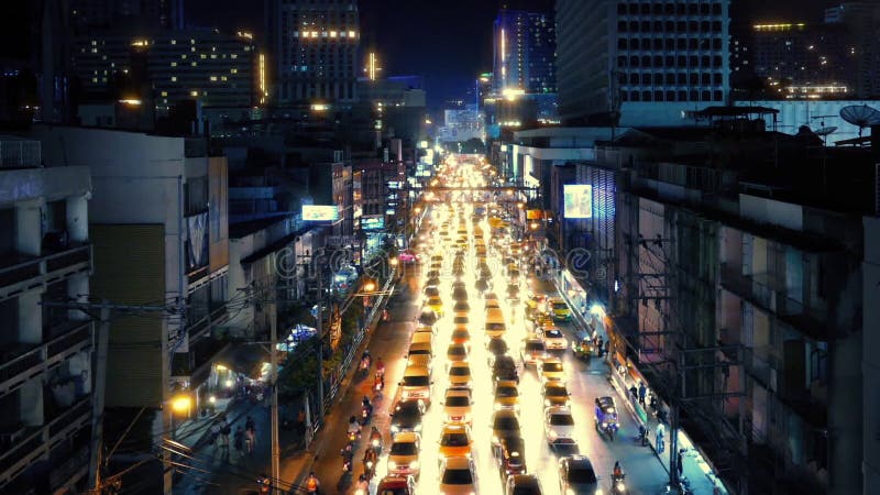 Cars Light Up Road through City at Night Stock Footage - Video of ...