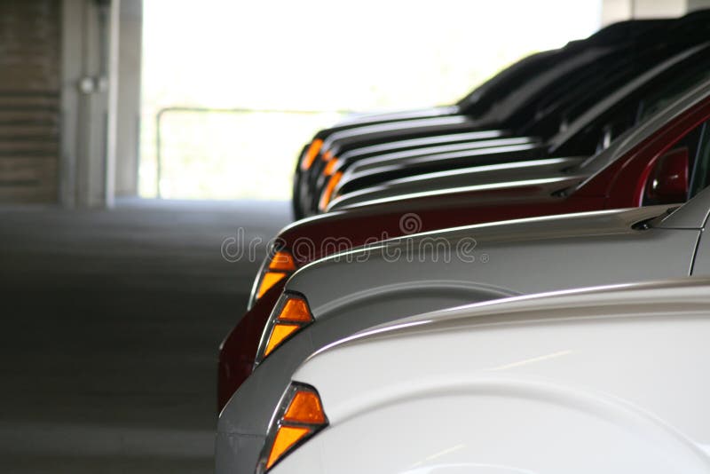 Cars lined up stock photo. Image of dealer, hood, lined - 2601880