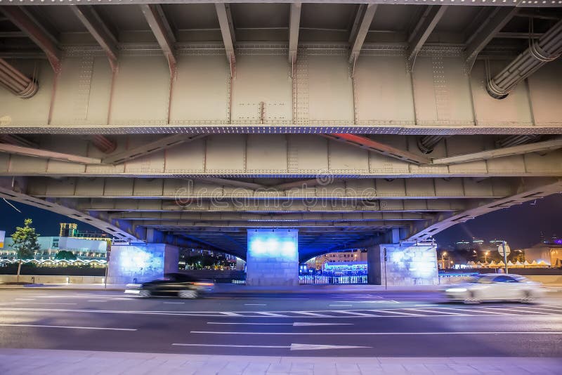 Cars Move at Night Under the Bridge in the City Stock Photo - Image of ...