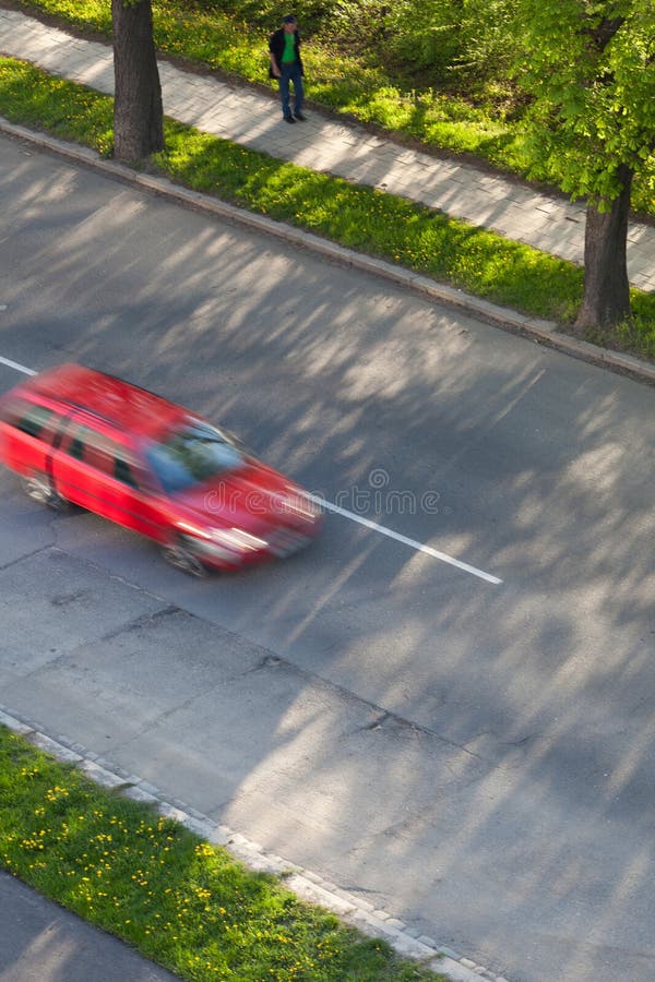 Cars moving fast on a road stock photo. Image of pollution - 17055764