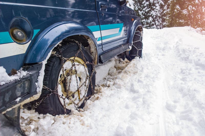 Cars Off the Road with Chains in Difficulty in the Snow Stock Photo ...