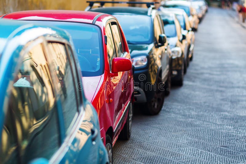 Cars parked along the road editorial stock image. Image of rear - 76065404