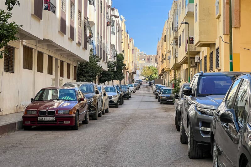 Cars Parked on Both Sides of the Road Editorial Stock Photo - Image of ...
