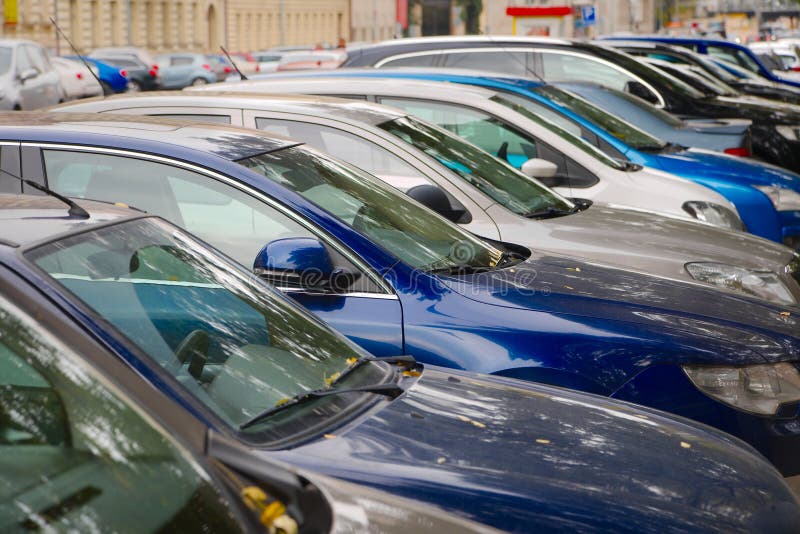 Cars parked in a row stock image. Image of front, transportation - 80138181