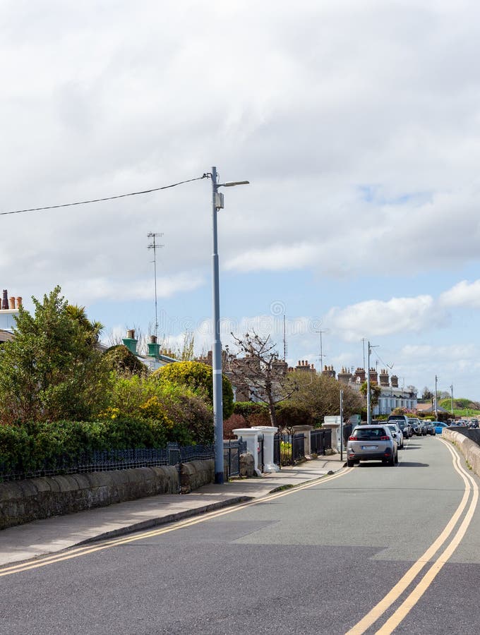 Narrow Street with Cars Parking on the Left Editorial Stock Photo ...