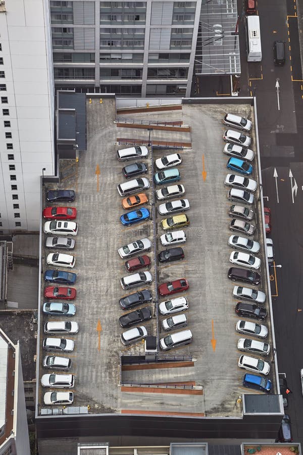 Cars parking on a rooftop stock image. Image of multistory - 115070797