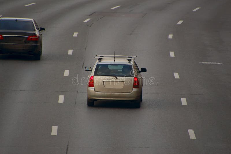 Cars racing on a freeway stock photo. Image of lane - 155249954