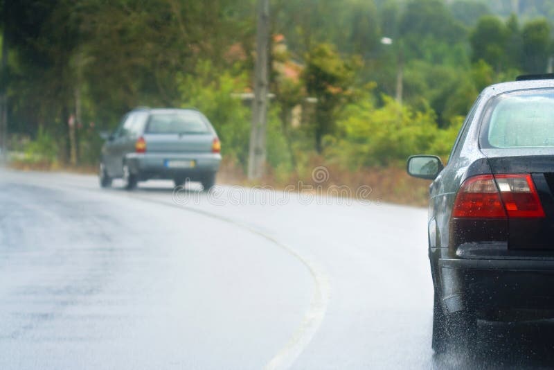 Cars in the rain stock image. Image of safety, cyclone - 3517551