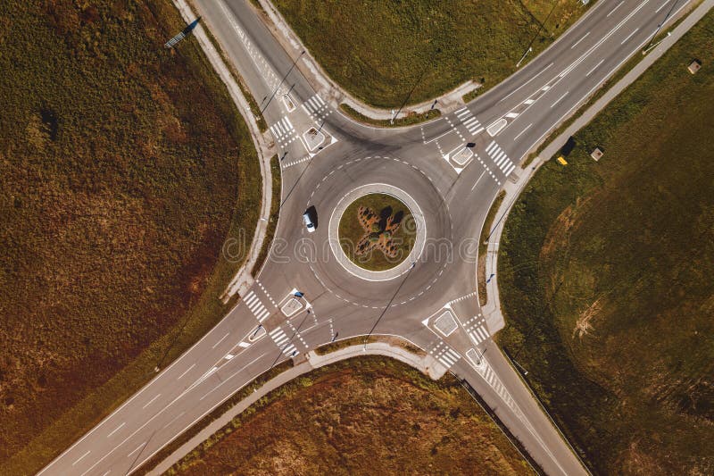 Cars on Road Intersection Roundabout Stock Photo - Image of rotunda ...