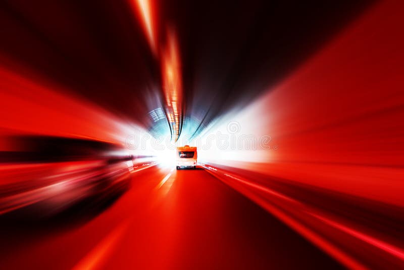Cars Rush through the Tunnel in the Beams of Searchlights. Stock Photo ...