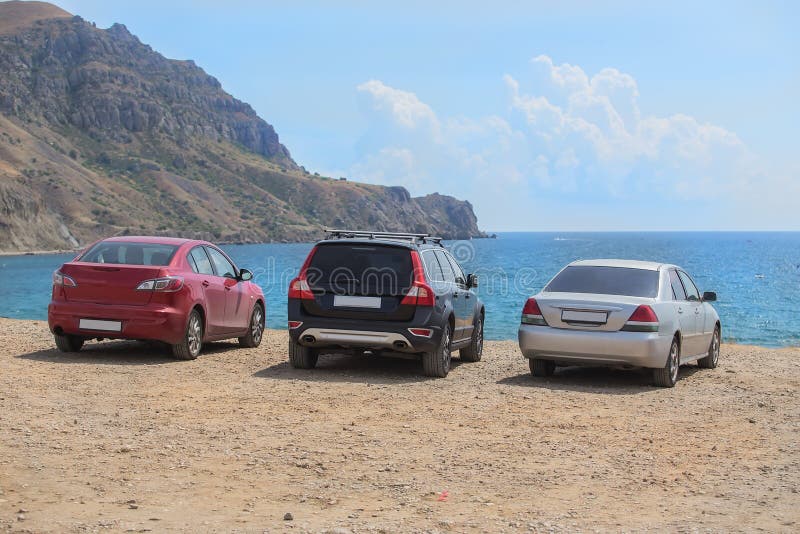 Cars on a sandy beach stock image. Image of landscape - 161570229