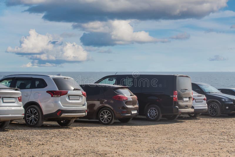 Cars on a sandy beach stock image. Image of seashore - 231711137