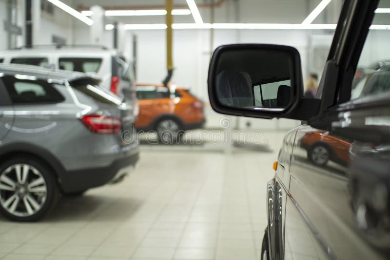 Cars in the Service Station. Maintenance of the Car . Stock Photo ...