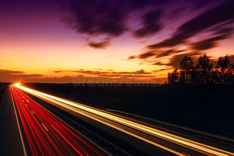 Cars speeding on a highway stock image. Image of drive - 60660933