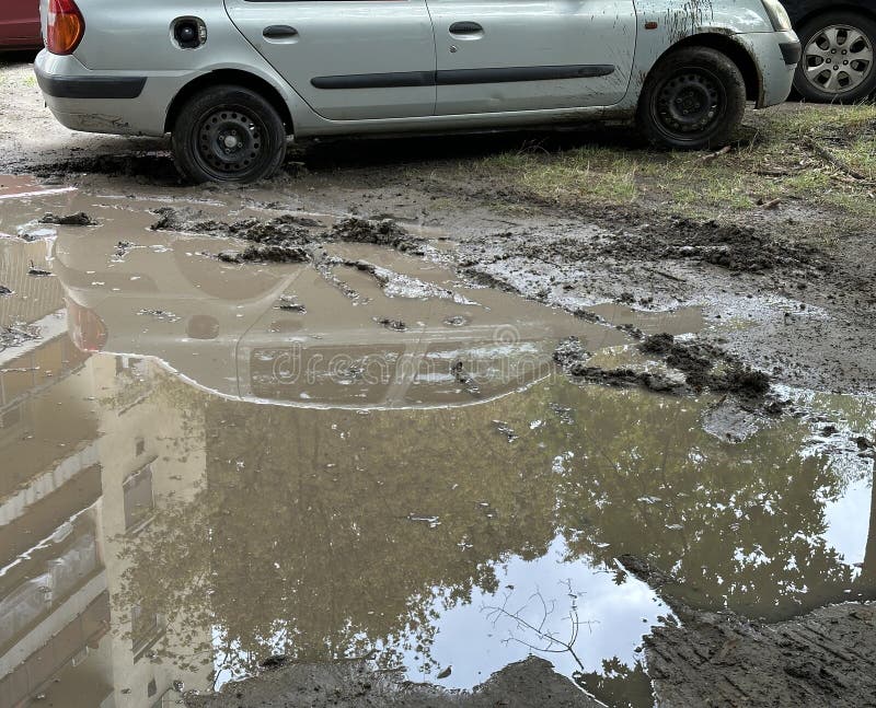 Cars Standing in the Mud Parking Lot Stock Image - Image of tail ...