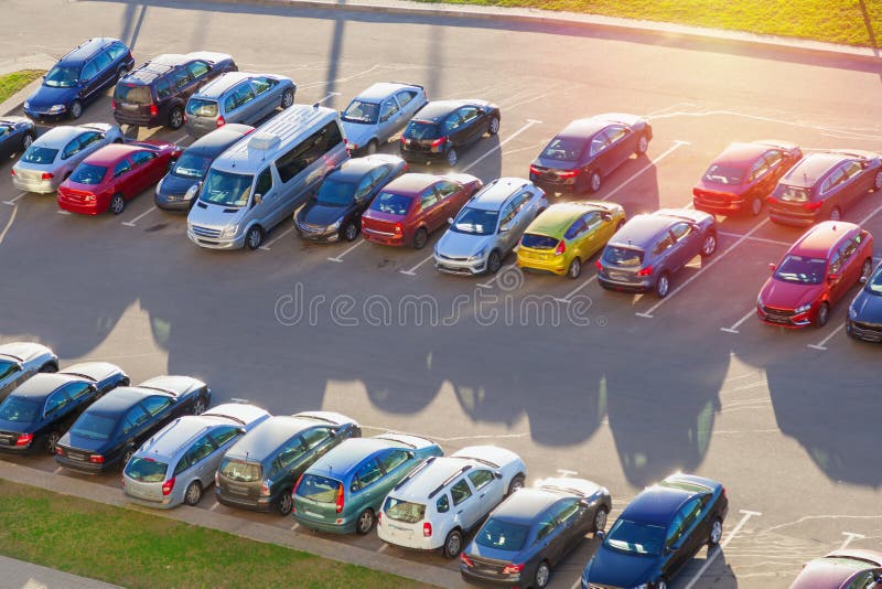 Cars standing in a rows stock image. Image of city, park - 140263731