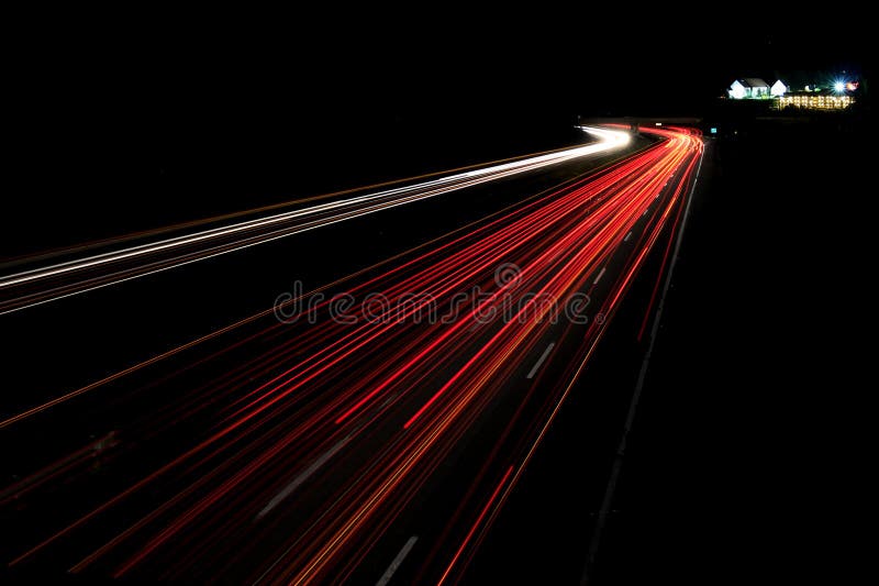 Cars Streaking by on the Interstate at Night. Stock Photo - Image of ...