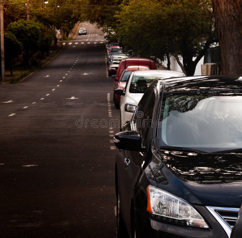 Cars on the street stock photo. Image of blackcar, city - 129104624