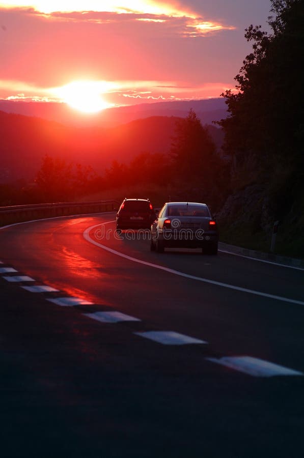 Cars in sunset stock photo. Image of drive, tree, roads - 1202114