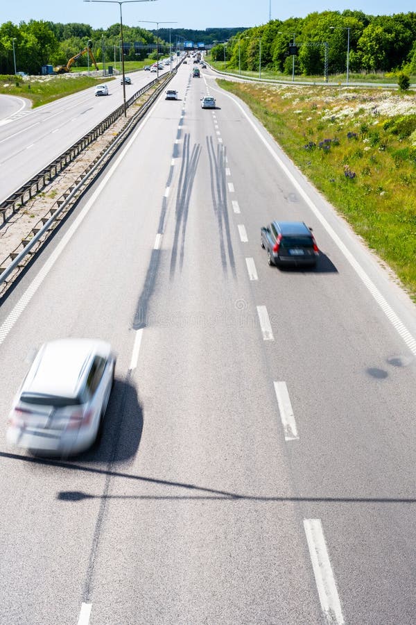 Cars on a Three Lane Highway Merging into Two Lanes.. Editorial Photo ...