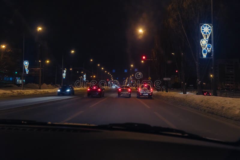 Cars in Traffic in Winter in the Evening Dark Editorial Photography ...