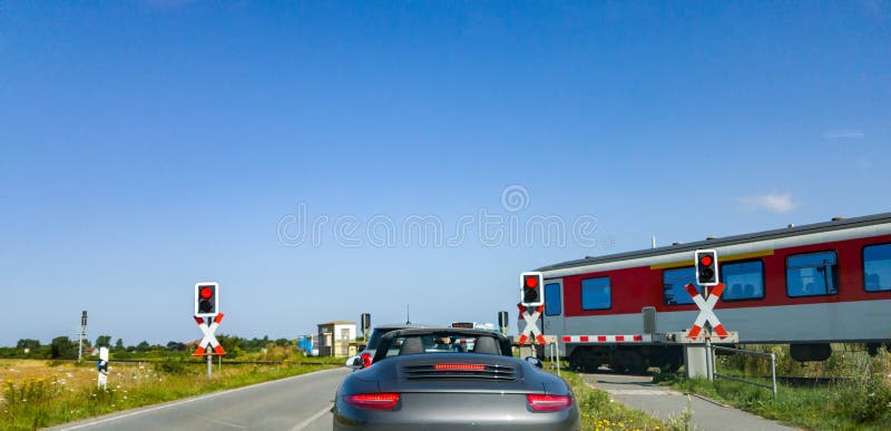 Cars Waiting at the Level Crossing on the Train Stock Photo - Image of ...