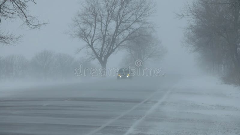 Cars on Winter Road at Blizzard Stock Image - Image of light, driving ...