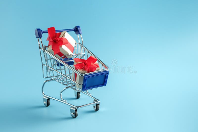 Cart with Gifts. Gift Boxes in a Supermarket Cart Stock Photo - Image ...