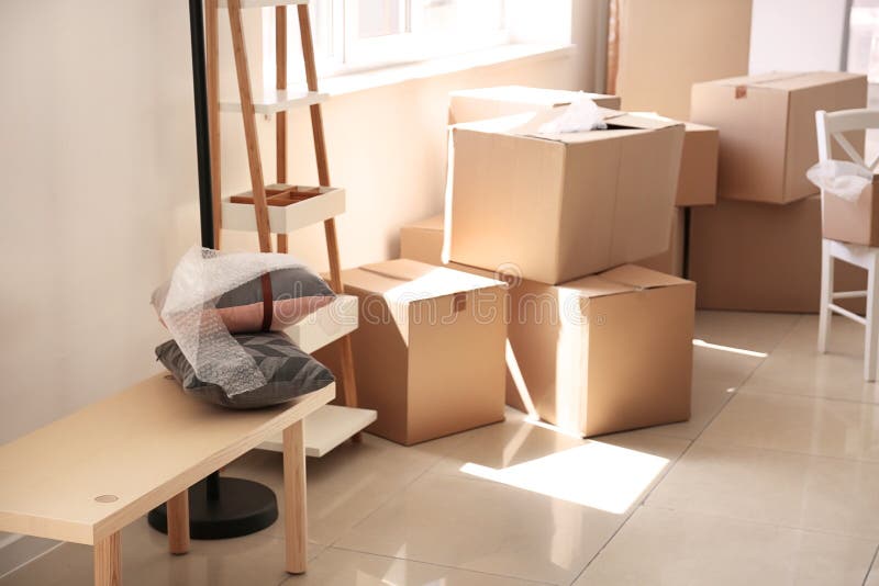 Carton Boxes and Interior Items on Floor in Room. Moving House Concept ...