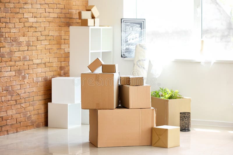 Carton Boxes and Interior Items in Room. Moving House Concept Stock ...