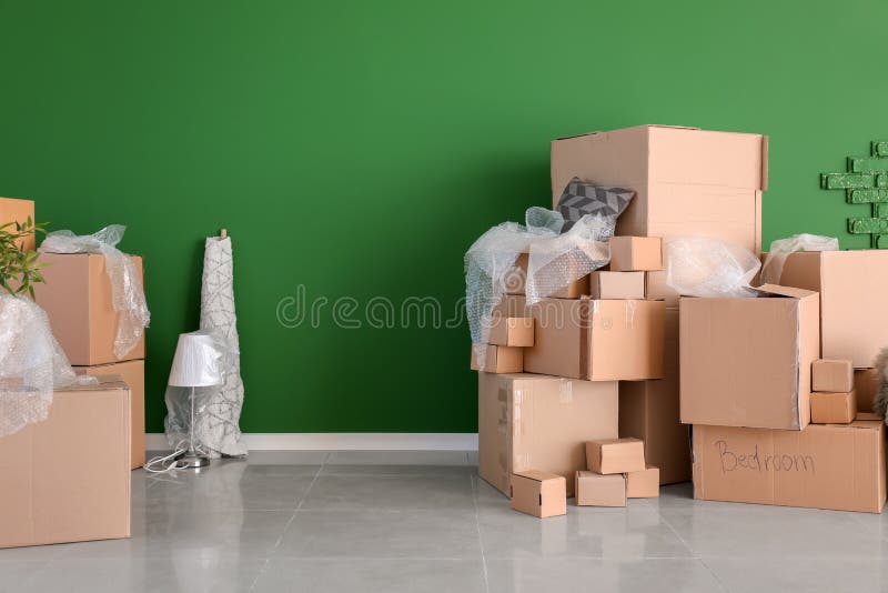 Carton Boxes and Interior Items in Room. Moving House Concept Stock ...
