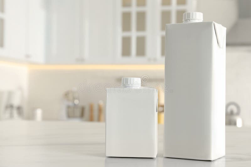 Carton Boxes of Milk on Table, Space for Text Stock Image - Image of ...