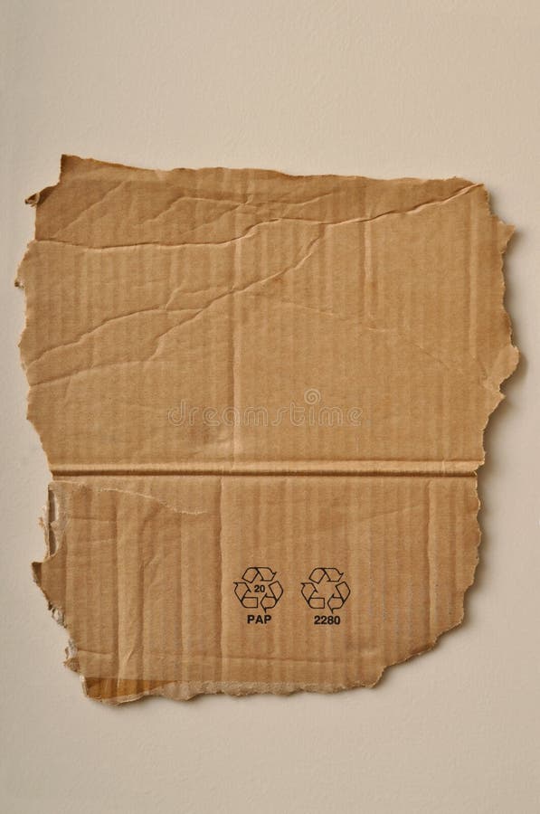 Carton déchiré et symboles image stock. Image du module - 68940489