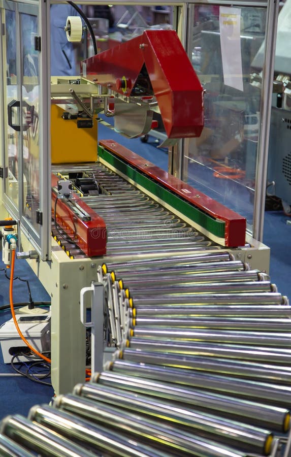 Carton Packaging Machine stock image. Image of machine - 142937057