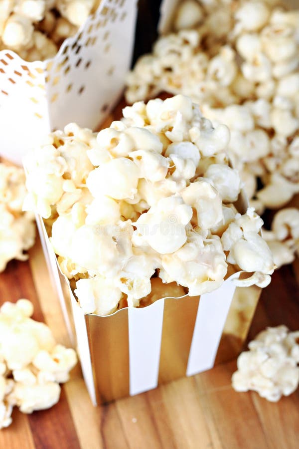 Cartons of caramel popcorn stock image. Image of overhead - 340307189