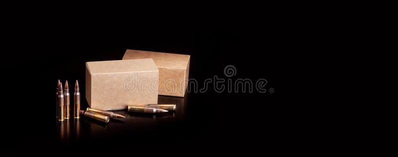 Cartridges for a Rifle on a Dark Back. Different Boxes with Ammunition ...