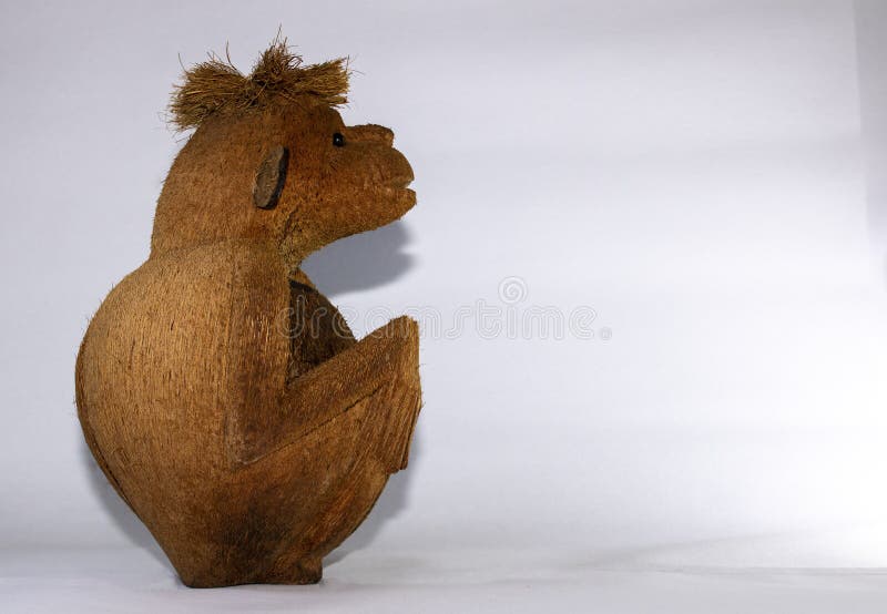 Carved Coconut Monkey in Sitting Stock Image - Image of doll, isolated ...
