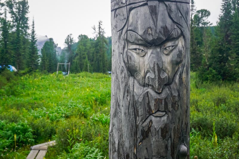 Carved Face in a Tree in the Siberian Taiga Editorial Image - Image of ...