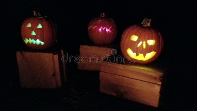 Carved Pumpkins beside a Campfire Stock Image - Image of camp, flame ...