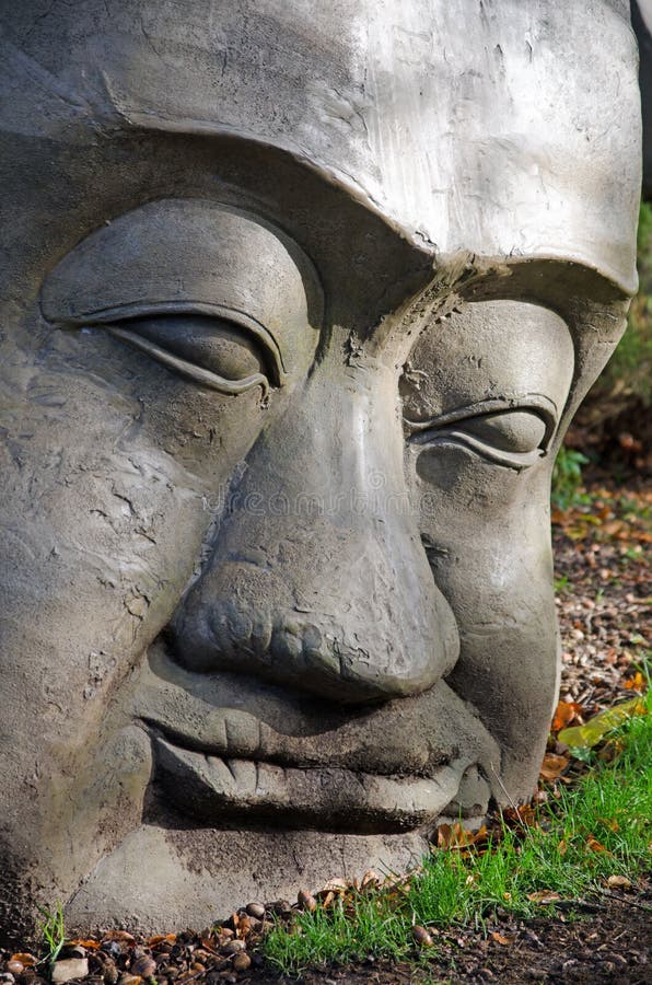 Carved Stone Head stock image. Image of portrait, meditation - 35175403