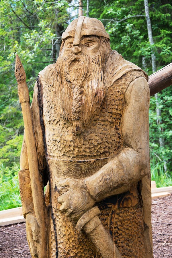 Carved wooden figure. stock photo. Image of character - 96914160