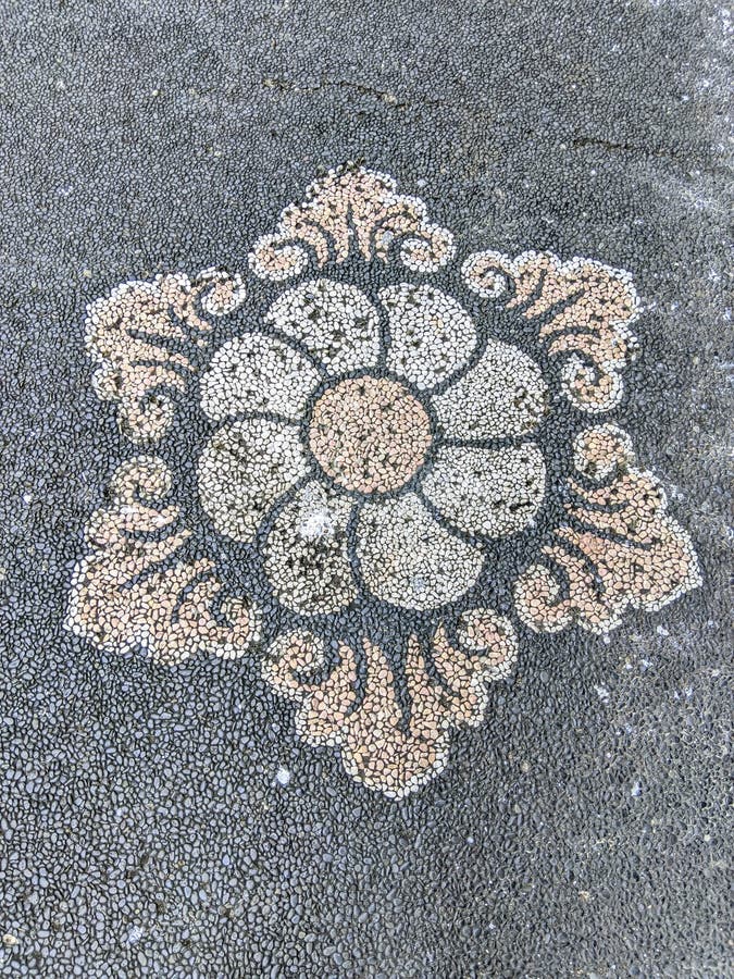 A Carving Made of Small White Stones with a Beautiful Design on the ...