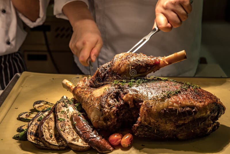 Carving Lamb stock image. Image of cooking, christmas - 138753125