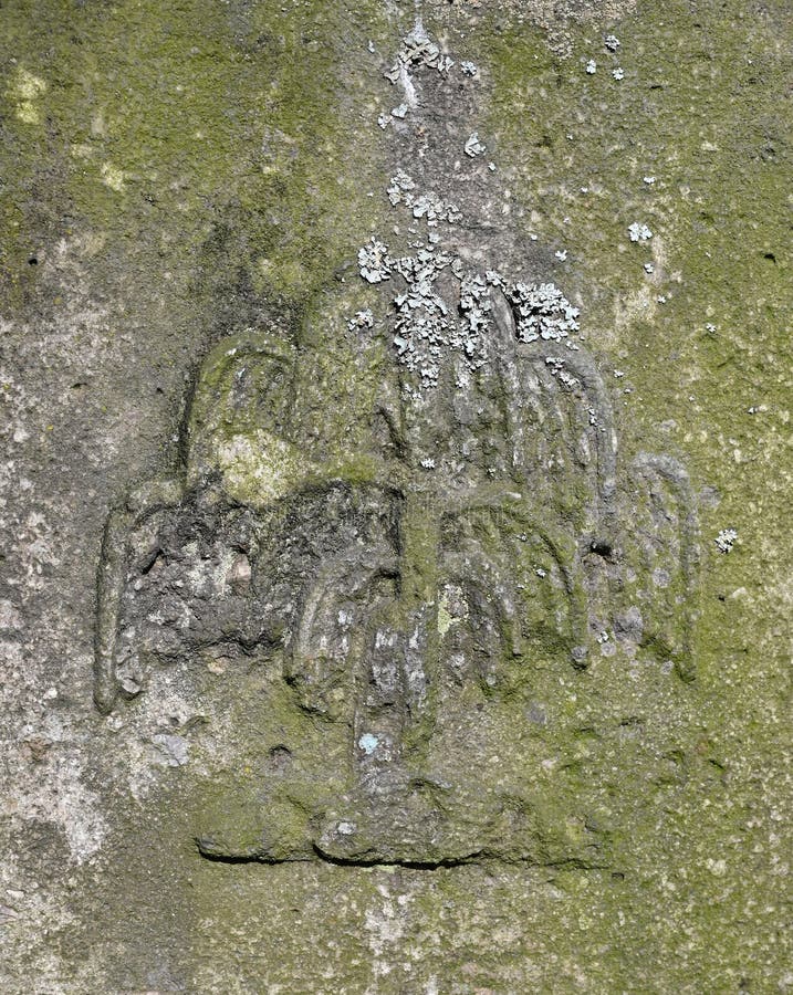 Carving of a Tree-like Symbol Appears Weathered on a Stone Surface ...