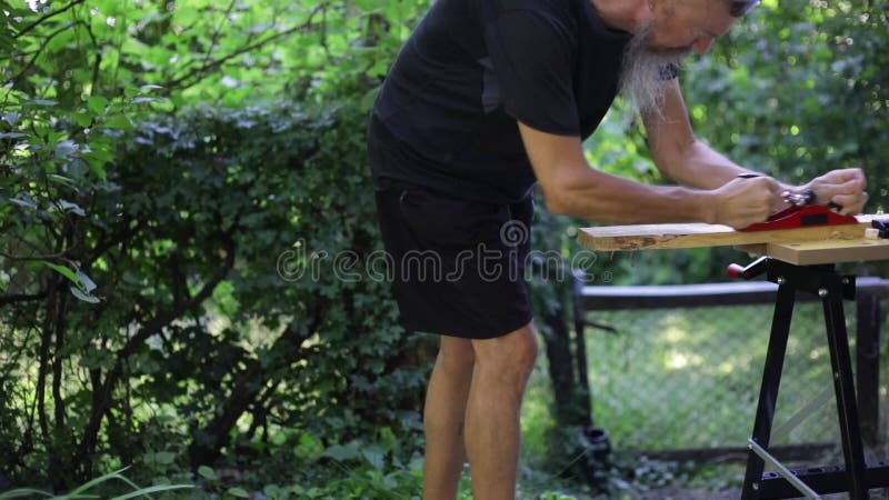 Carving Wood Plank Using Hand Plane Stock Video - Video of carpenter ...
