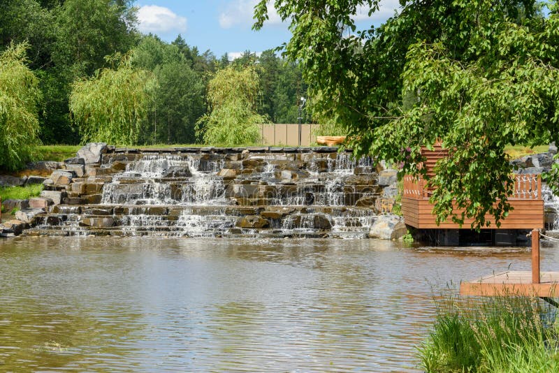A Cascade of an Artificially Created Waterfall Made of Stone Steps ...