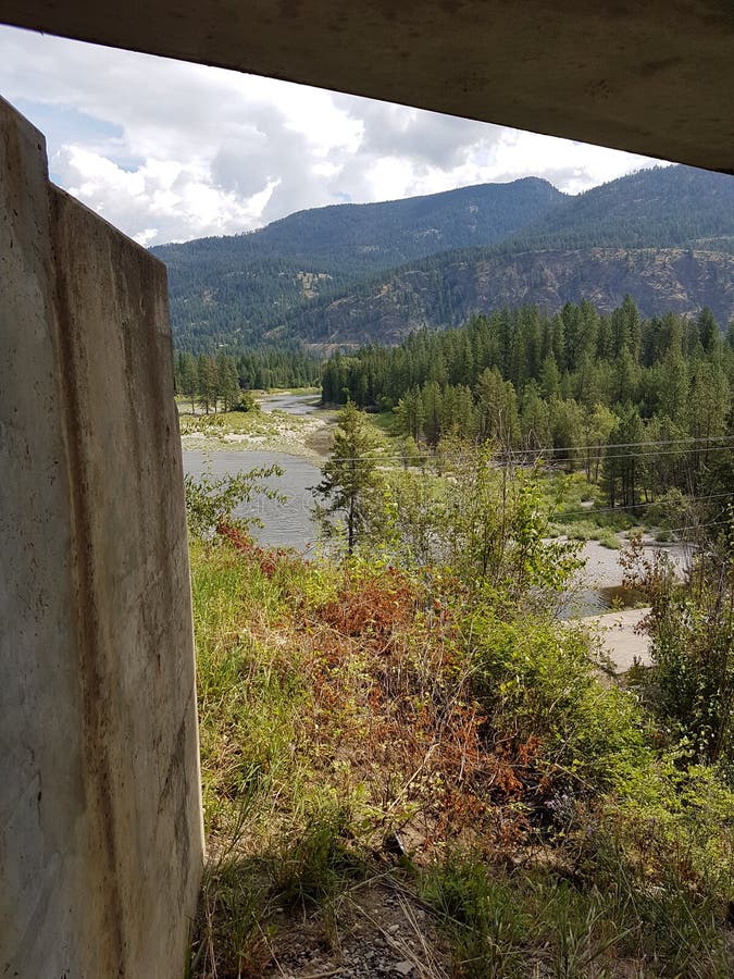 Cascade Falls under Bridge stock photo. Image of cascade - 153490082