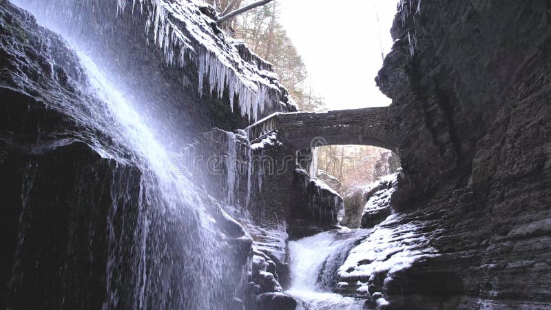 A Cascade of Waterfalls Inside a Cavern. Rainbow Falls at Watkins Glen ...