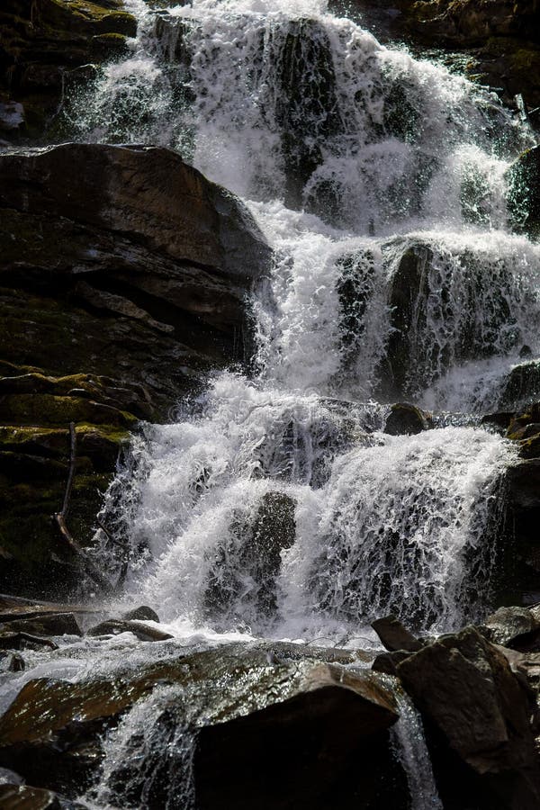 Cascading Down a Small Mountain Stream, the Water Runs Over Basalt ...